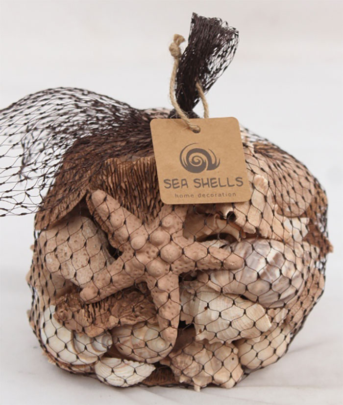 Espace Maison - Shellfish and dry material mix in net